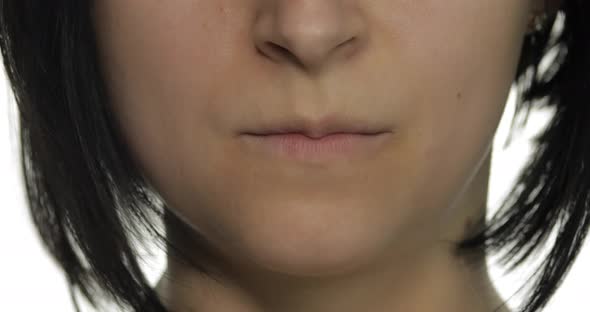 Young Woman Ingesting a Pill and Drinking It with a Glass of Water ...