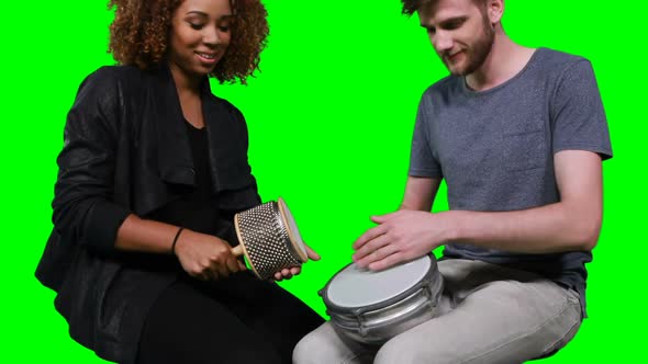 Happy musicians playing cabasa and drum, Stock Footage | VideoHive