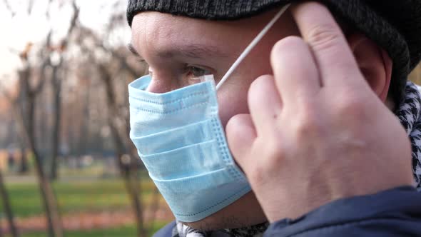 Man Take Off Mask in Park, Stock Footage | VideoHive