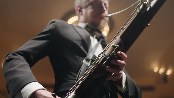 Bassoonist with Instrument on Scene Musician is Performing Music By ...