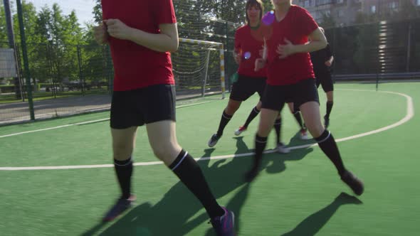 Female Athletes Doing Lateral Run Exercise on Soccer Field, Stock Footage