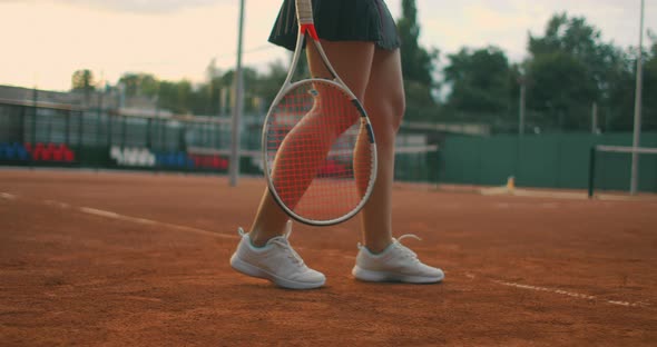 Slow Motion of Woman Making Tennis Serve. Slow Motion: Section of Woman ...