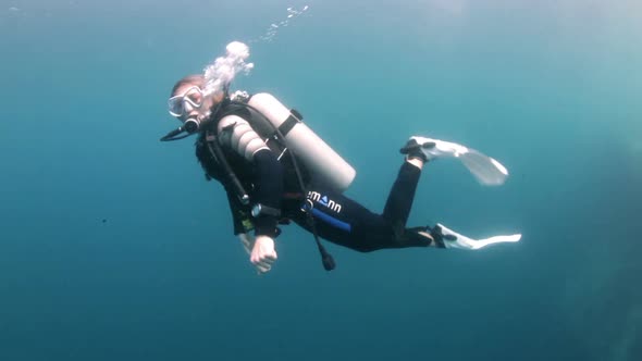 Woman Diving in Blue Water, Stock Footage | VideoHive