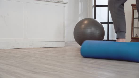 Close up of male foot roll out exercise mat, Stock Footage | VideoHive
