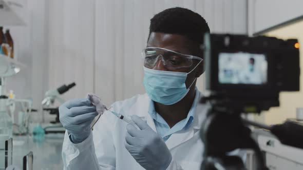 Male Scientist Filming Experiment, Stock Footage | VideoHive