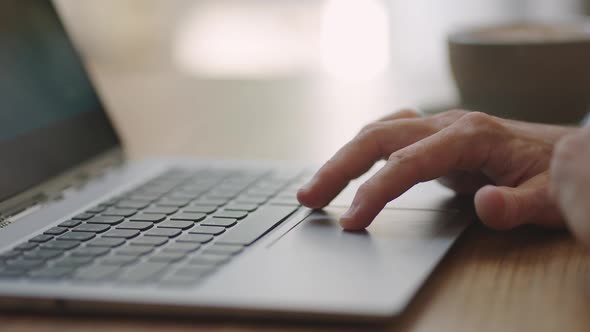 Close Up Hand of Man Scrolling a Website Using Laptop Track Pad, Stock ...