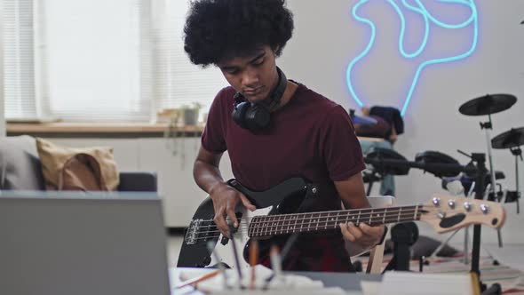 Young Black Man Playing Bass Guitar, Stock Footage | VideoHive