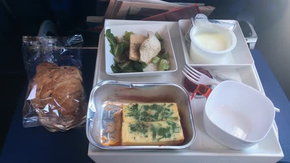 Close Up Breakfast Tray on Board the Flight Airplane Meal Omlette ...