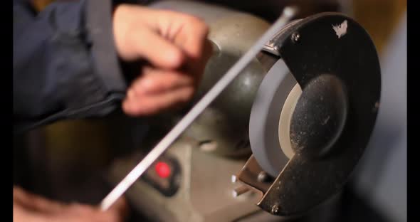Woman Polishing Rod with Rotating Grindstone, Stock Footage | VideoHive