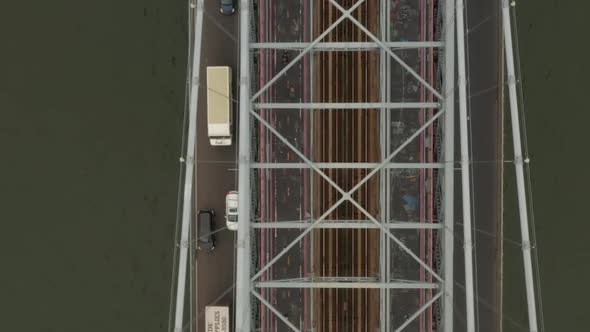 AERIAL: Close Up Overhead Top Down Birds View Flight Over Bridge with ...