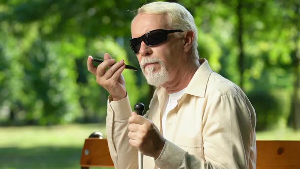 Sad Blind Man Finishing His Conversation on Smartphone, Voice Commands ...