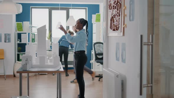 Modern Engineer Using Mobile Phone to Design Construction Layout with ...