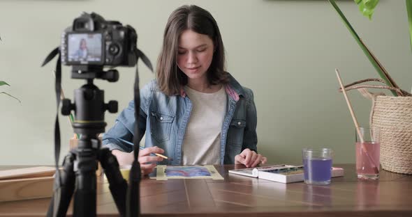 Artist, Teenage Girl, Draws and Records on Video Camera for His Blog ...