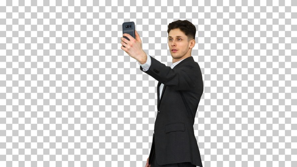 Young business man walking and taking a selfie, Alpha Channel, Stock ...