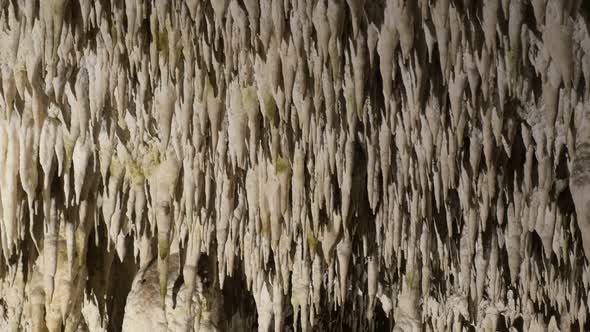 Stalactite decorations inside cave 3840X2160 UltraHD tilting footage ...