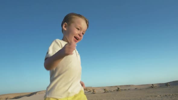 Little child running to his father on the beach, Stock Footage | VideoHive