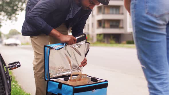 Happy Food Delivery Man Giving Order to Customer, Stock Footage | VideoHive