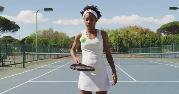 Video of african american female tennis player holding racket and ...