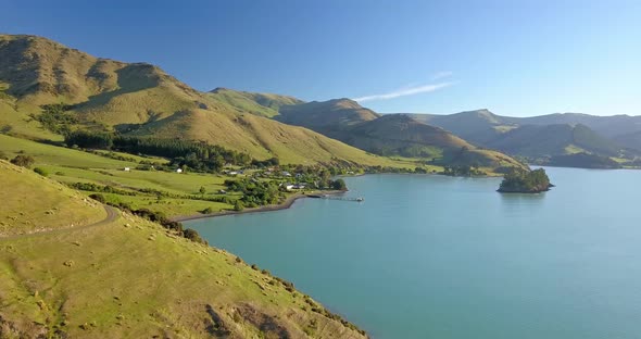 Cinematic aerial view over Port Levy, a Maori settlement on Banks ...