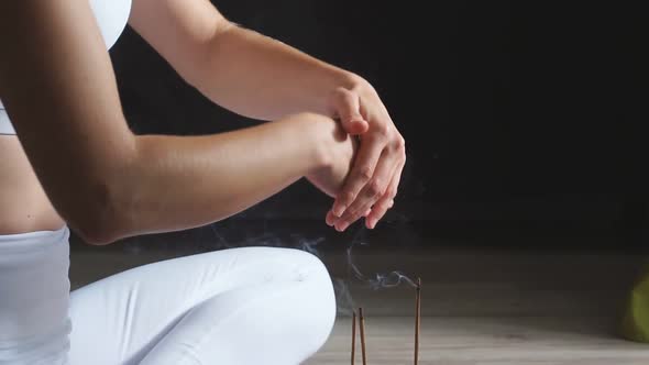 Meditating Female Sit on Bed and Relax Smoking Insence Yoga Sticks ...