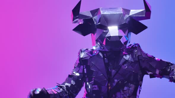 Shiny Bull in Costume Made of Mirrors Dancing Robot Dance on Neon Blue ...