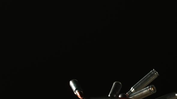 Bullets falling bouncing in ultra slow motion , Stock Footage | VideoHive