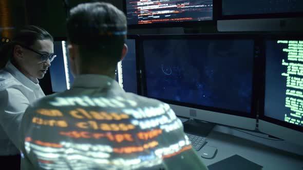 Computer Programmers Talking in Office at Night, Stock Footage | VideoHive