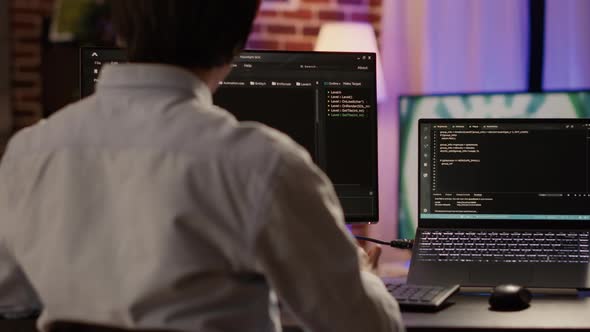 Software Developer Coding Firewall Server on Computer and Laptop, Stock ...