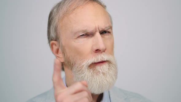Old Man Wagging Finger in Studio, Stock Footage | VideoHive