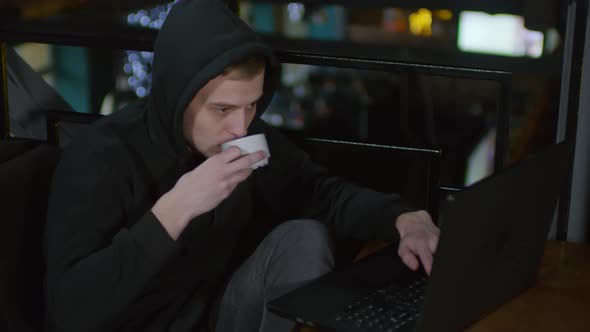 Programmer Hacking and Drinking Tea, Stock Footage | VideoHive