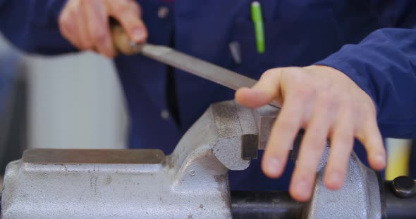 filing iron piece on vice, Stock Footage | VideoHive