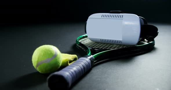 Tennis balls, racket and virtual reality headset in studio 4k, Stock ...
