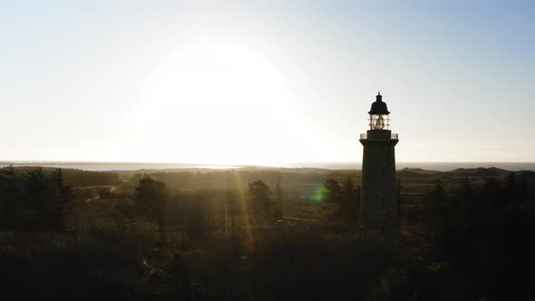 Drone Flight From Sunlit Lodbjerg Lighthouse, Stock Footage | VideoHive