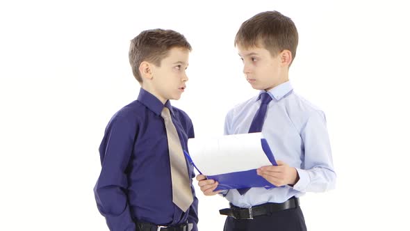 Boy Businessman Leader Gives Orders To His Subordinate in Closeup ...