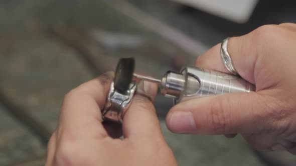 Unrecognizable Jeweler Buffing Ring, Stock Footage | VideoHive