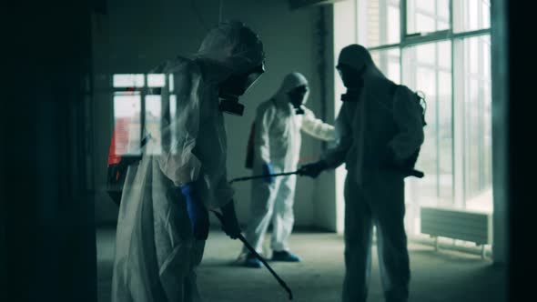 People in Hazmats Sanitize Room During Pandemic, Stock Footage | VideoHive