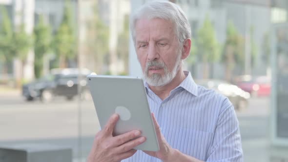 Portrait of Old Man Using Digital Tablet Outdoor, Stock Footage | VideoHive