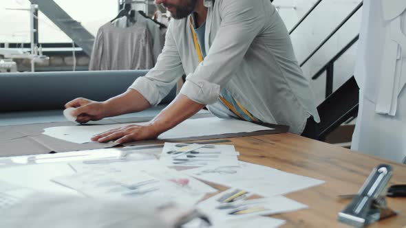 Male Tailor Drawing with Chalk on Fabric in Dressmaking Studio, Stock ...