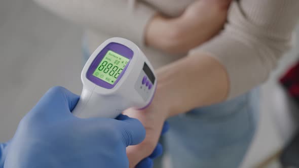 Doctor Measures the Temperature of His Patient and Shows the Normal ...