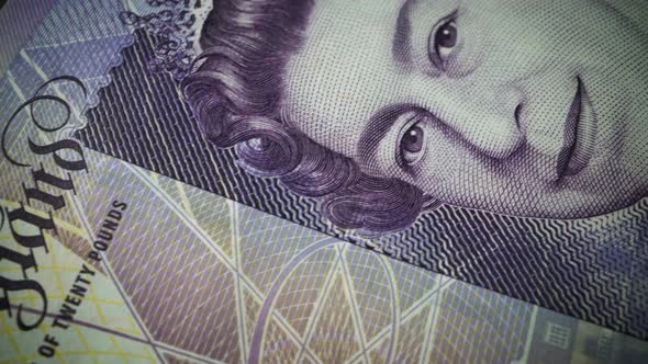 Fifty British Pound paper banknote in close up macro view dolly shot ...