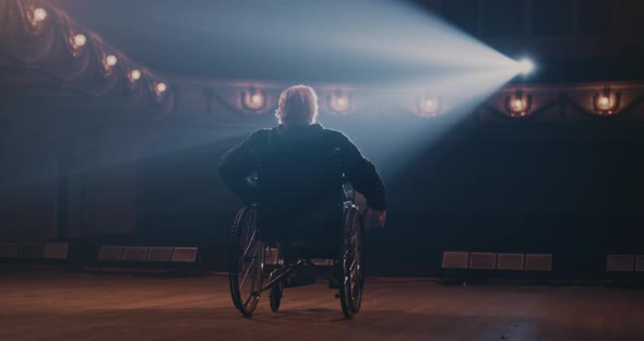 Senior Actor on Wheelchair Leaving Stage, Stock Footage | VideoHive