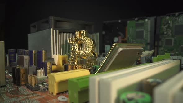 Bitcoin BTC and CPU Processor on the Motherboard with Rotating. Main ...