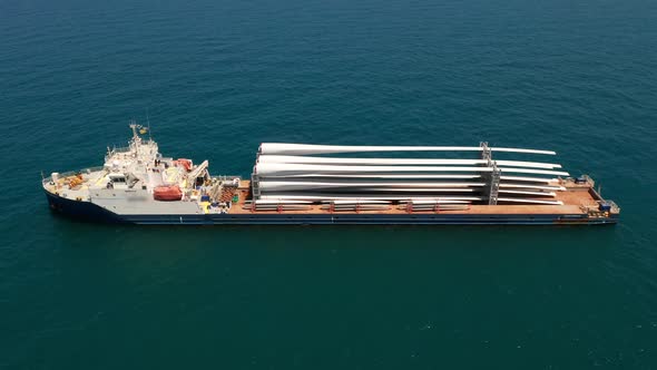 Heavy load carrier ship loaded with Electric Turbine Blades anchored at ...