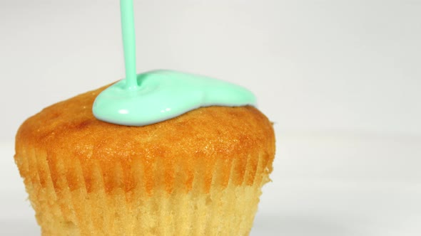 Pouring Cyan Icing Over the Cake, Stock Footage | VideoHive