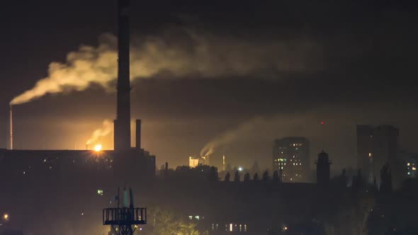 Pipes with Smoke and Residential Apartment Buildings Night Timelapse ...