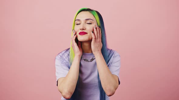 Young Cute Lady with Colorful Hairdo Preening Hair Feeling Satisfied of ...