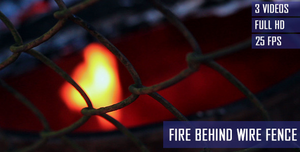 Fire In Barrel Behind Wire Fence, Stock Footage | VideoHive