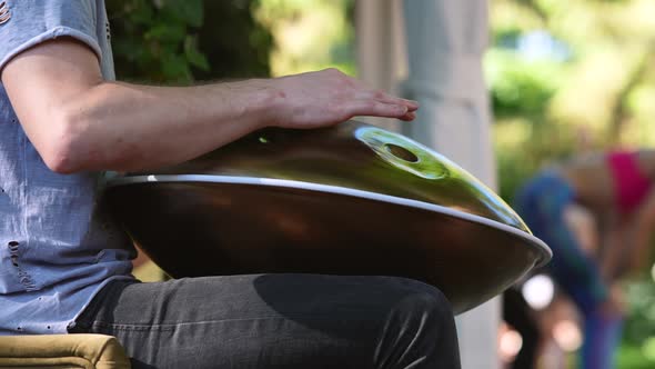 A Close Up of Male Hands Playing Handpan Drum, Stock Footage | VideoHive