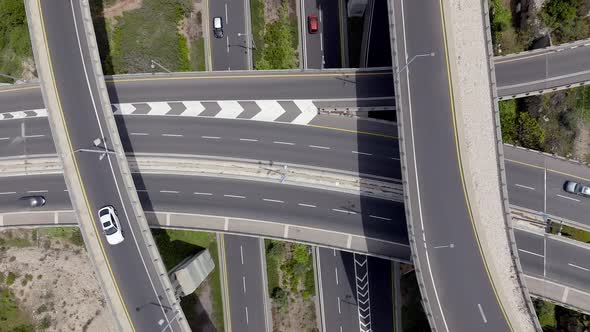 Massive multi level highway interchange with traffic on all routes ...