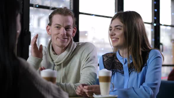 Close Up Laughing Mates Talking in Coffee Shop, Stock Footage | VideoHive